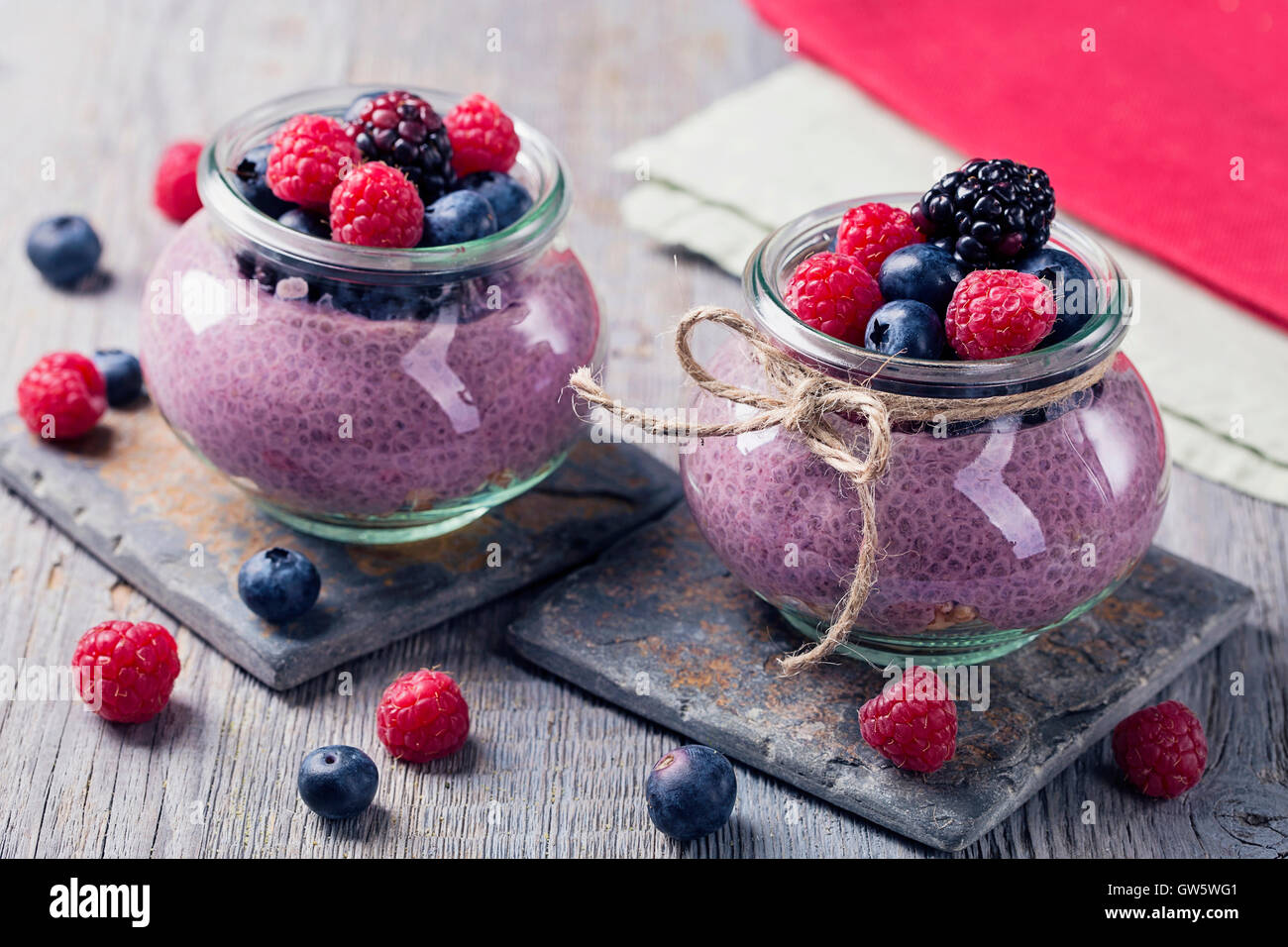 Chia seeds acai pudding with berries Stock Photo - Alamy