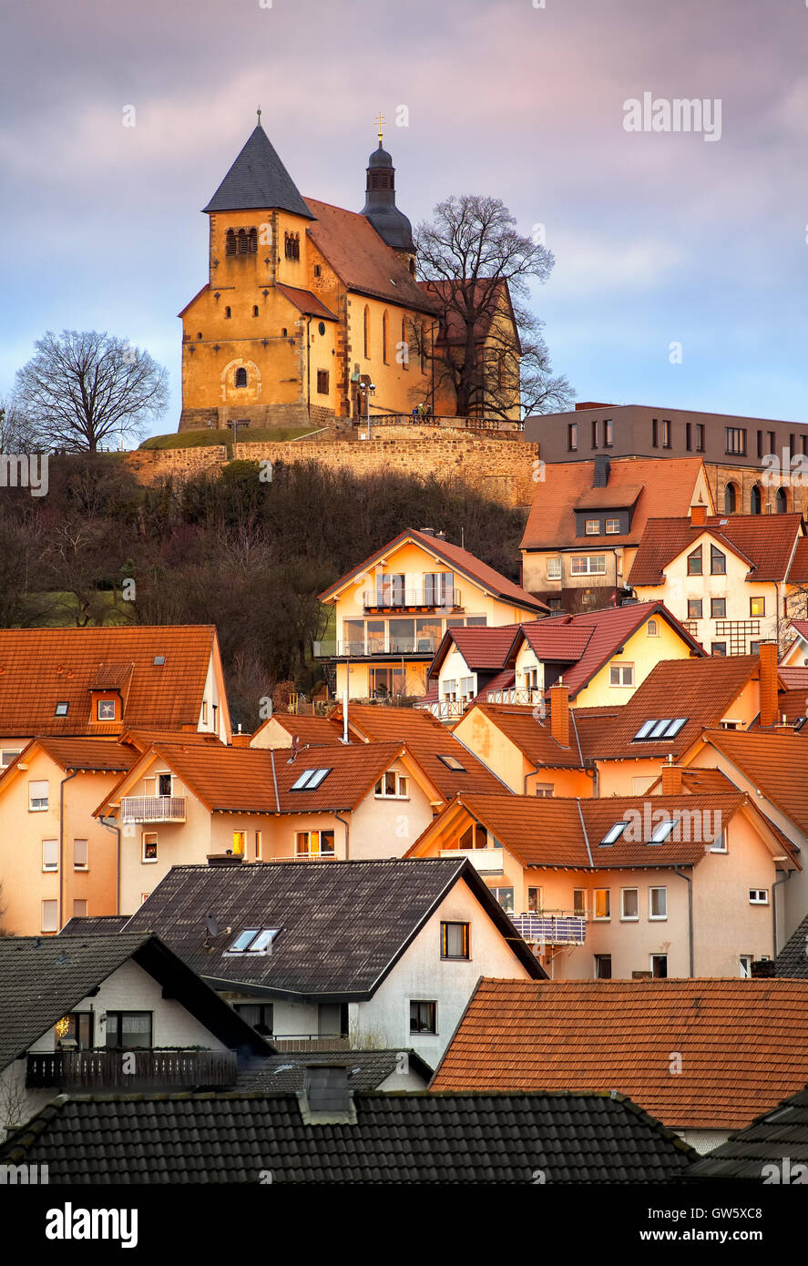 Old gothic church on a hill over the german town Fulda near Frankfurt ...