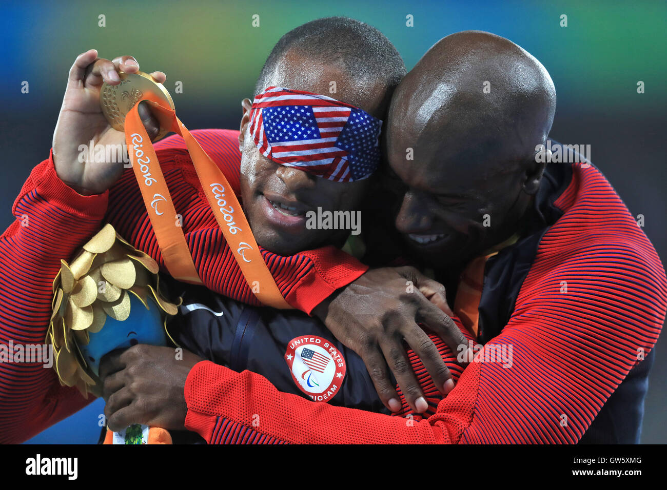 USA's David Brown celebrates on the podium after wining the gold medal ...
