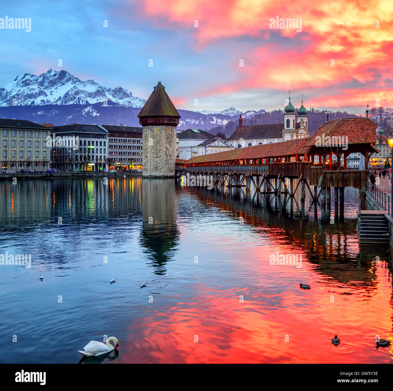 Dramatic sunset over the old town of Lucerne, Chapel Bridge, Water ...