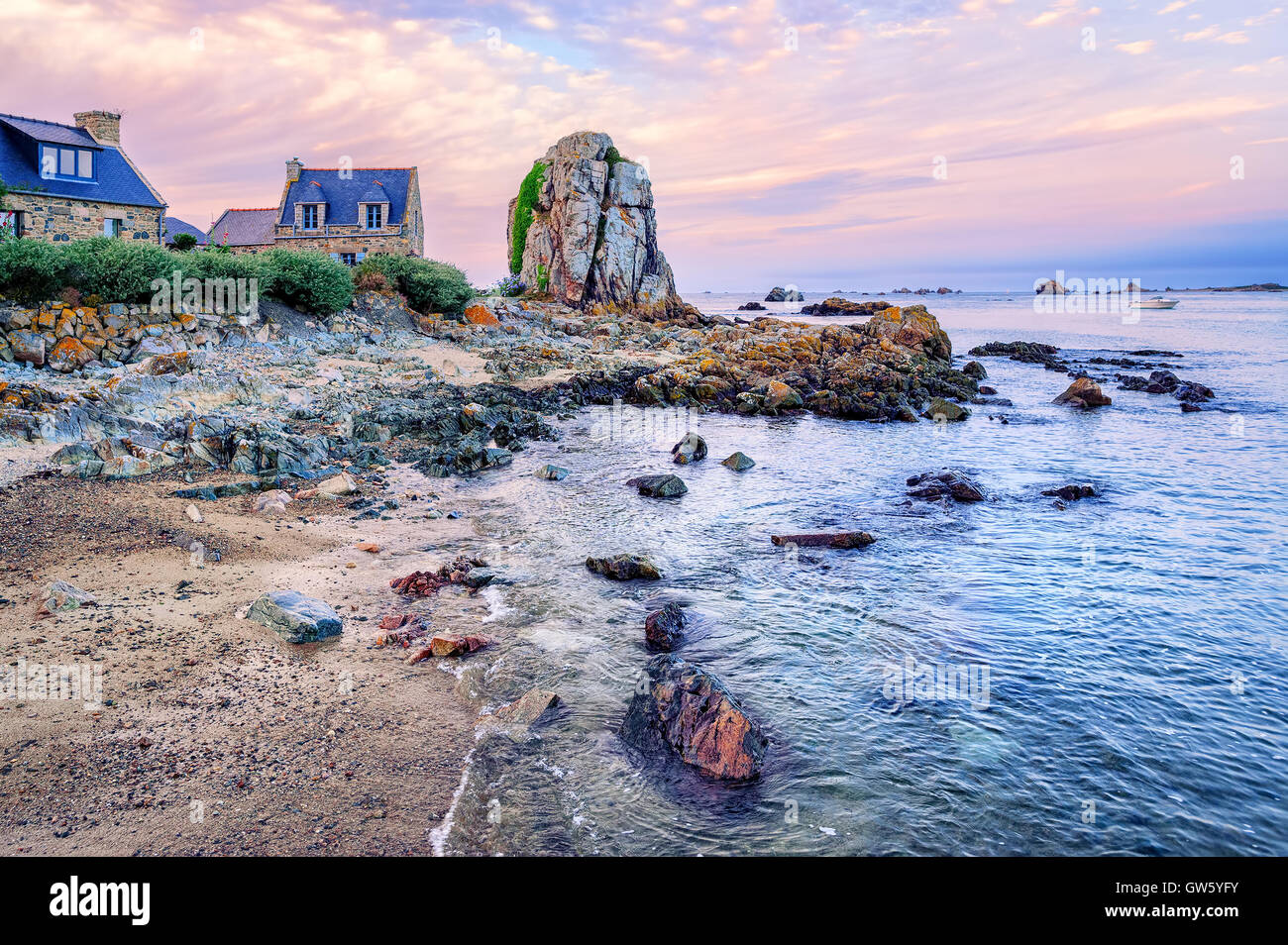 Traditional breton stone houses on the rocky atlantic coast of English ...