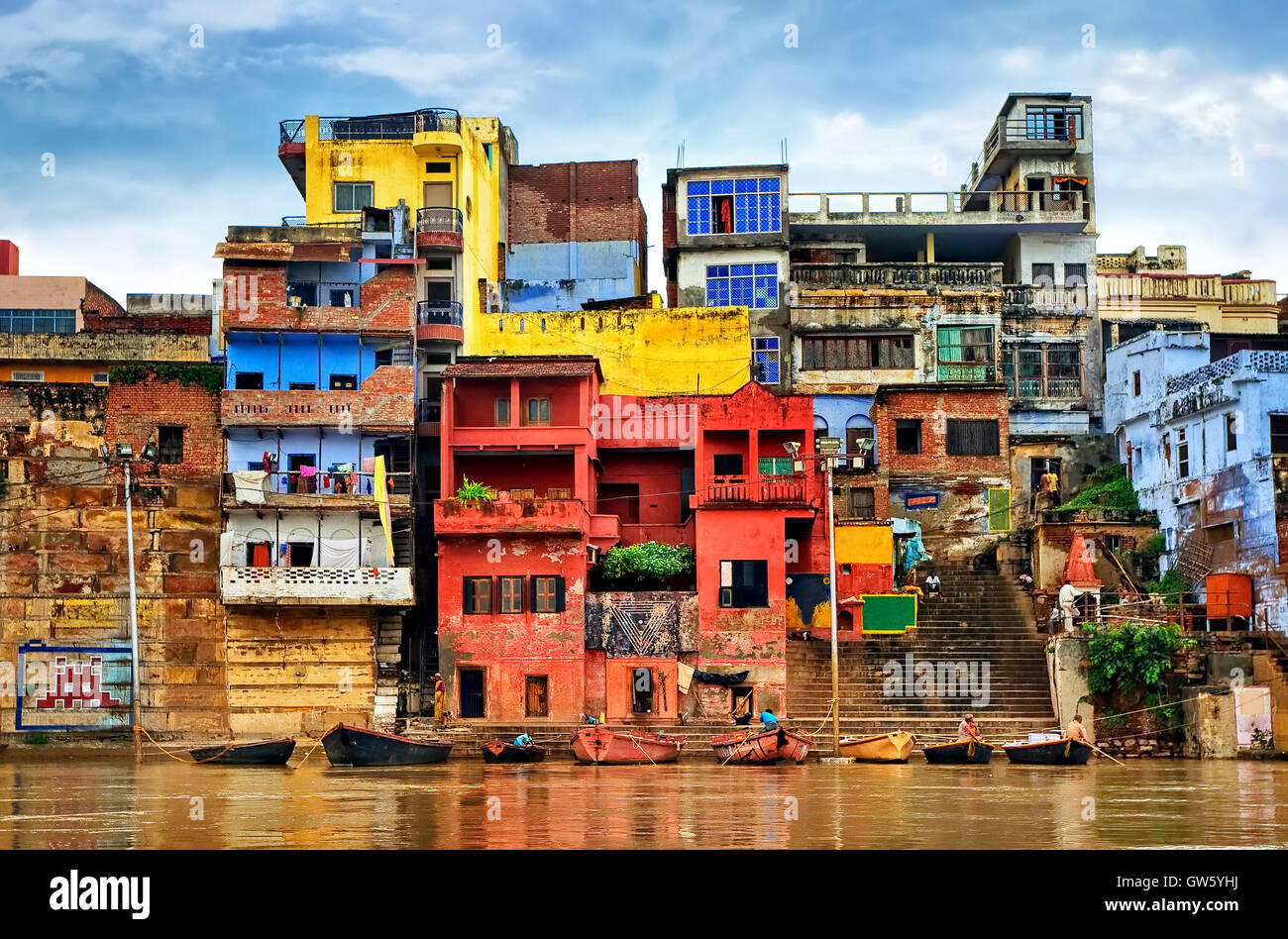 Chaotic colorful houses on the banks of river Ganges, Varanasi, India ...