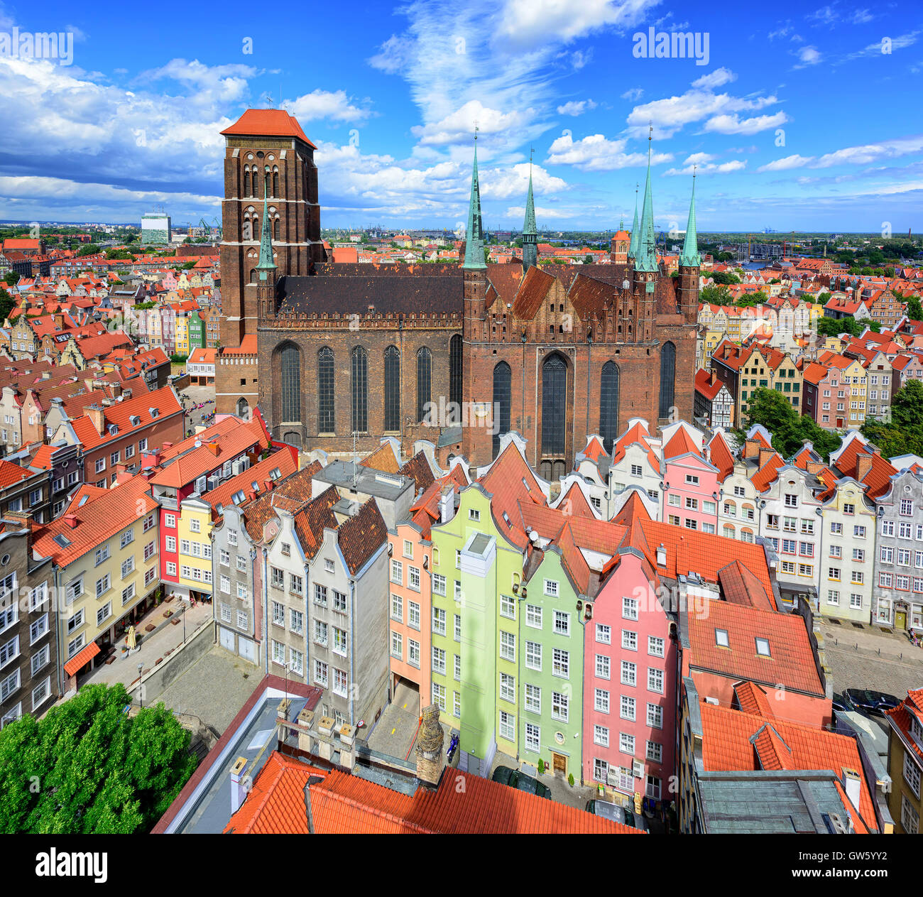 Saint Mary's Cathedral and colorful gothic houses in the historical old ...