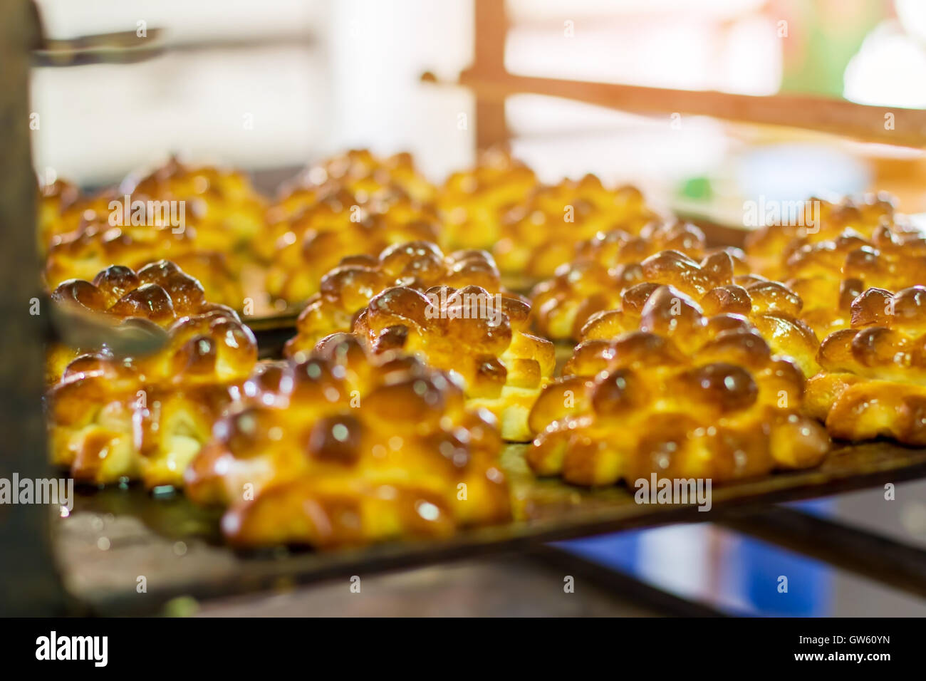 Cooked pastry on tray Stock Photo - Alamy