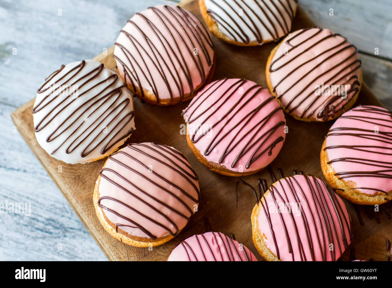 Glazed biscuits on wooden board Stock Photo - Alamy