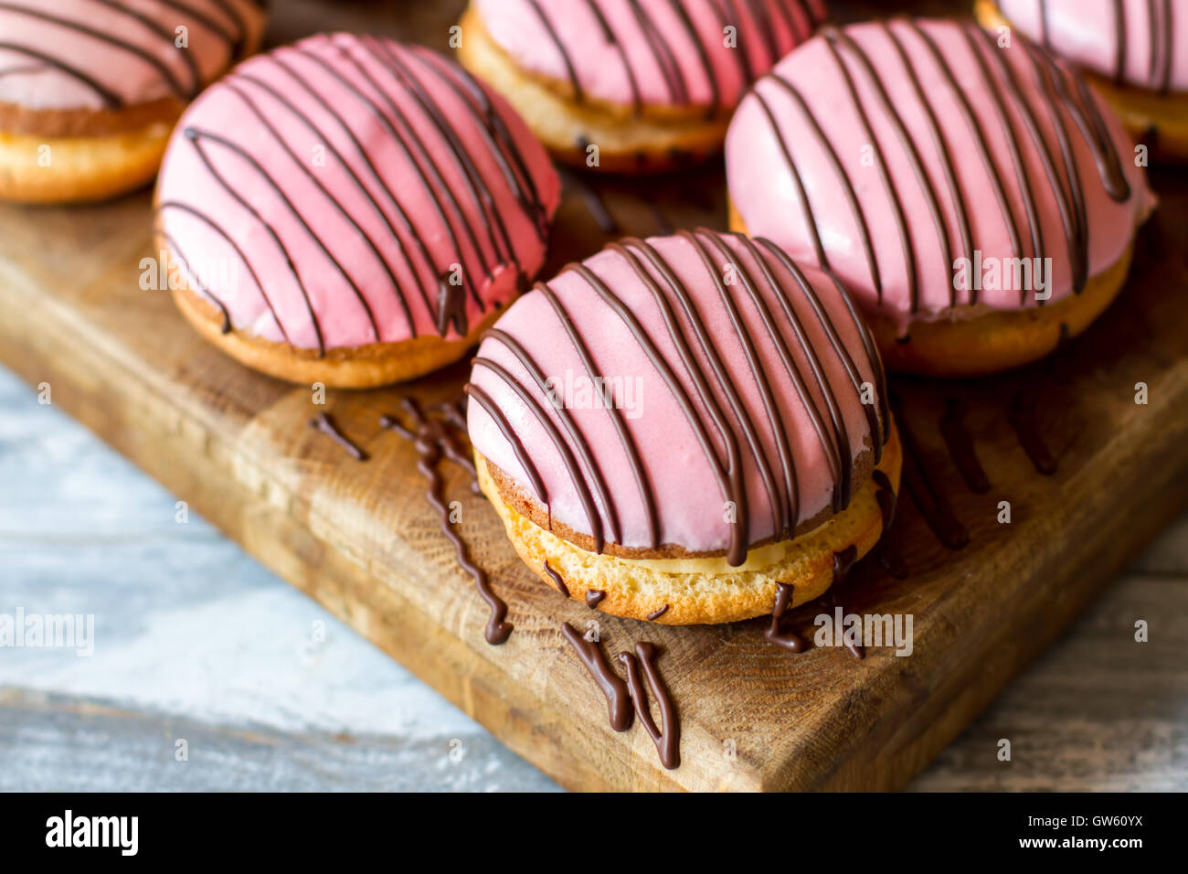 Sandwich cookies with pink glaze Stock Photo - Alamy