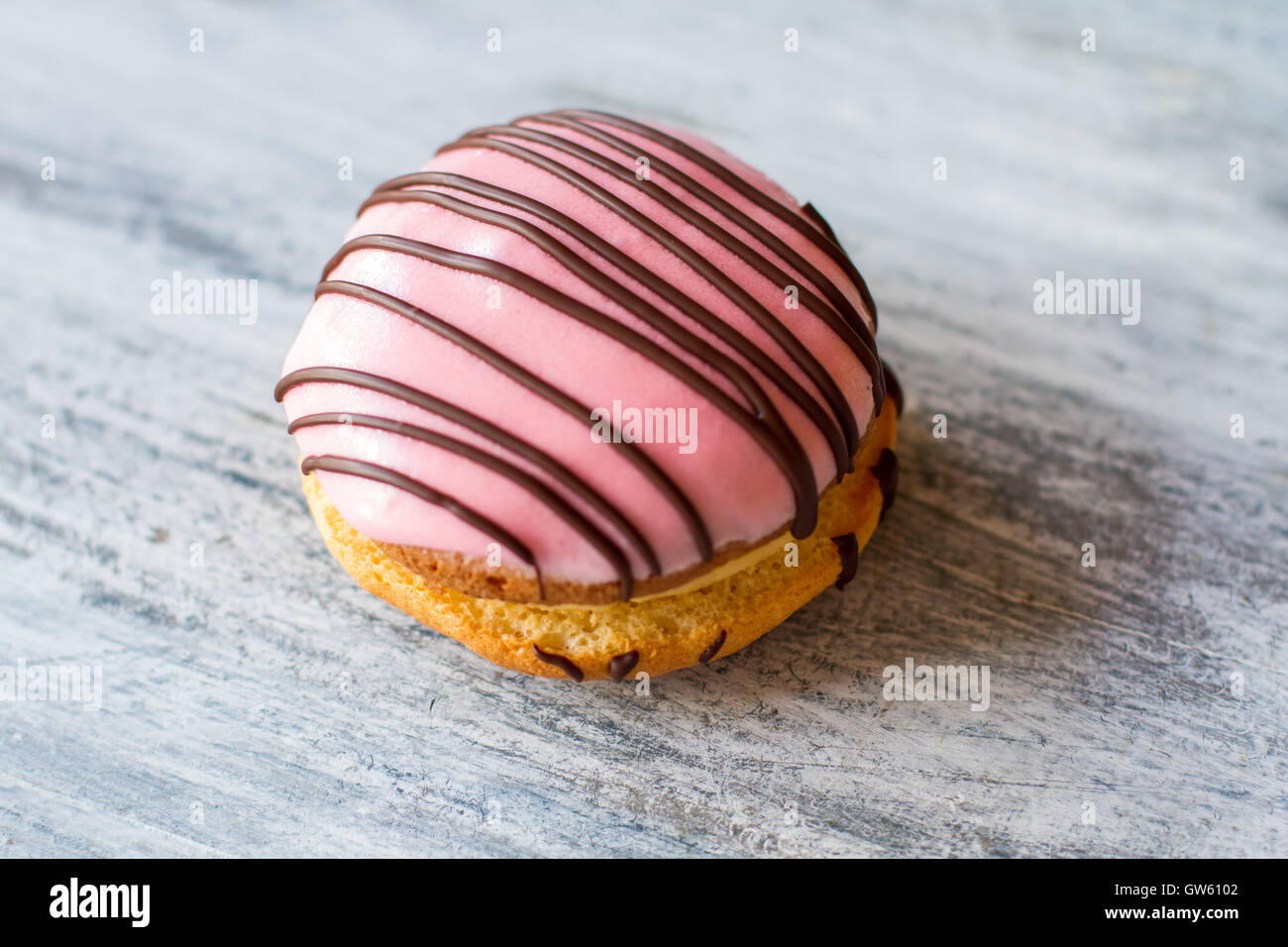Biscuit with pink glaze Stock Photo - Alamy