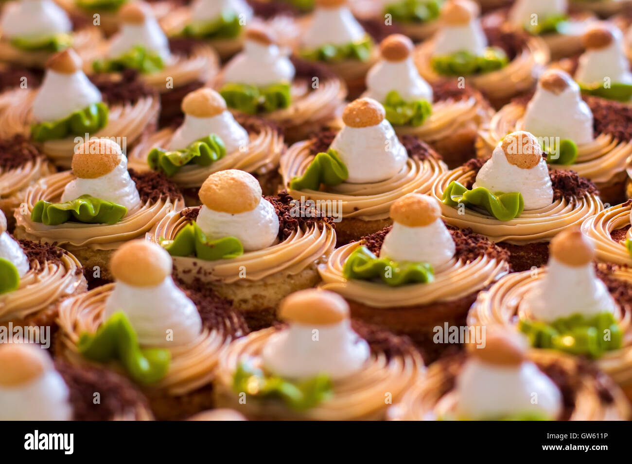Small cakes with decoration Stock Photo - Alamy