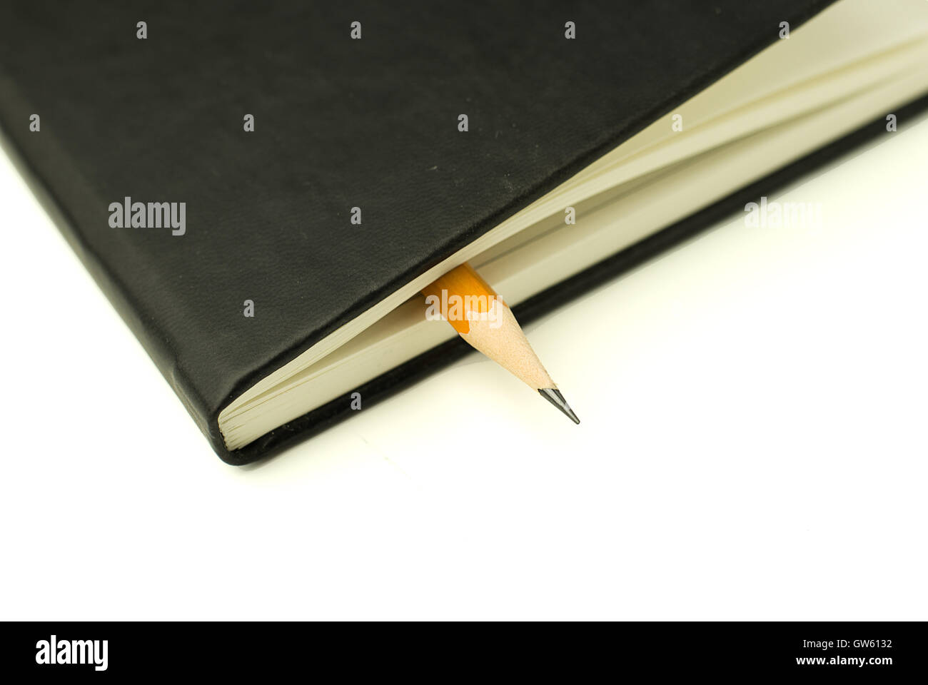 Diary and pencil on white Stock Photo - Alamy