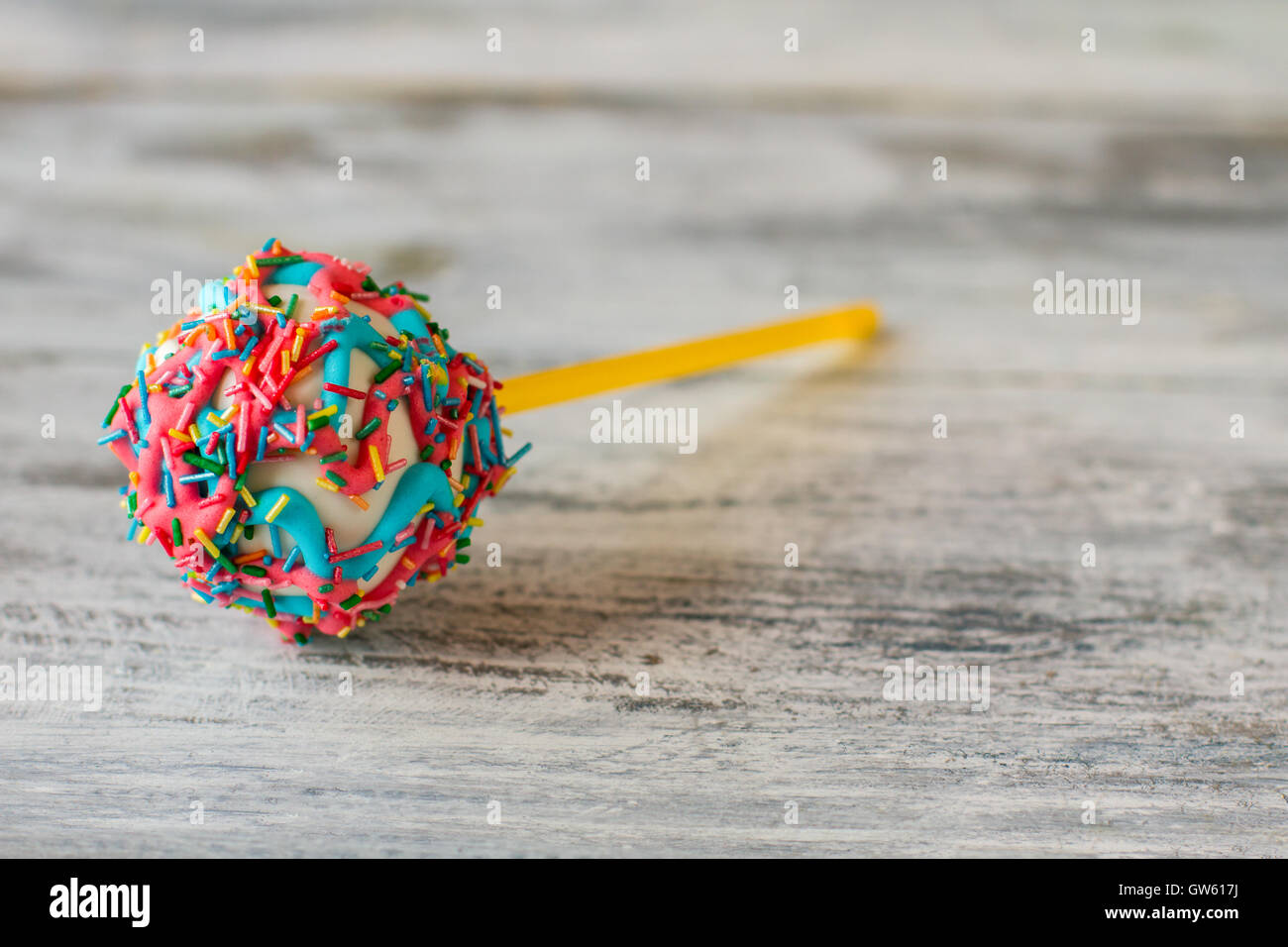 Cake pop with frosting Stock Photo - Alamy