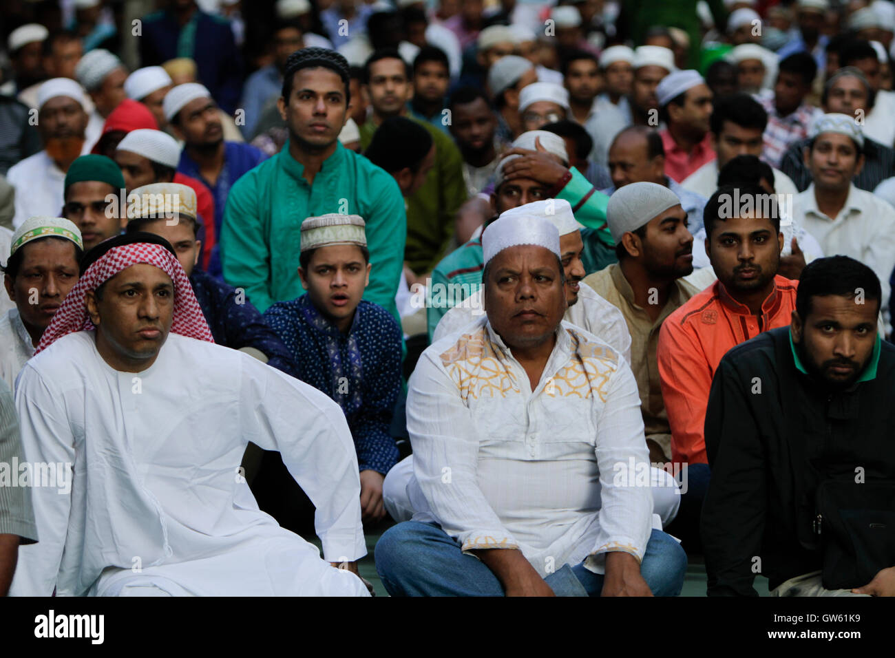 The congregation sits during the prayer. Muslims in Rome celebrated Eid ...