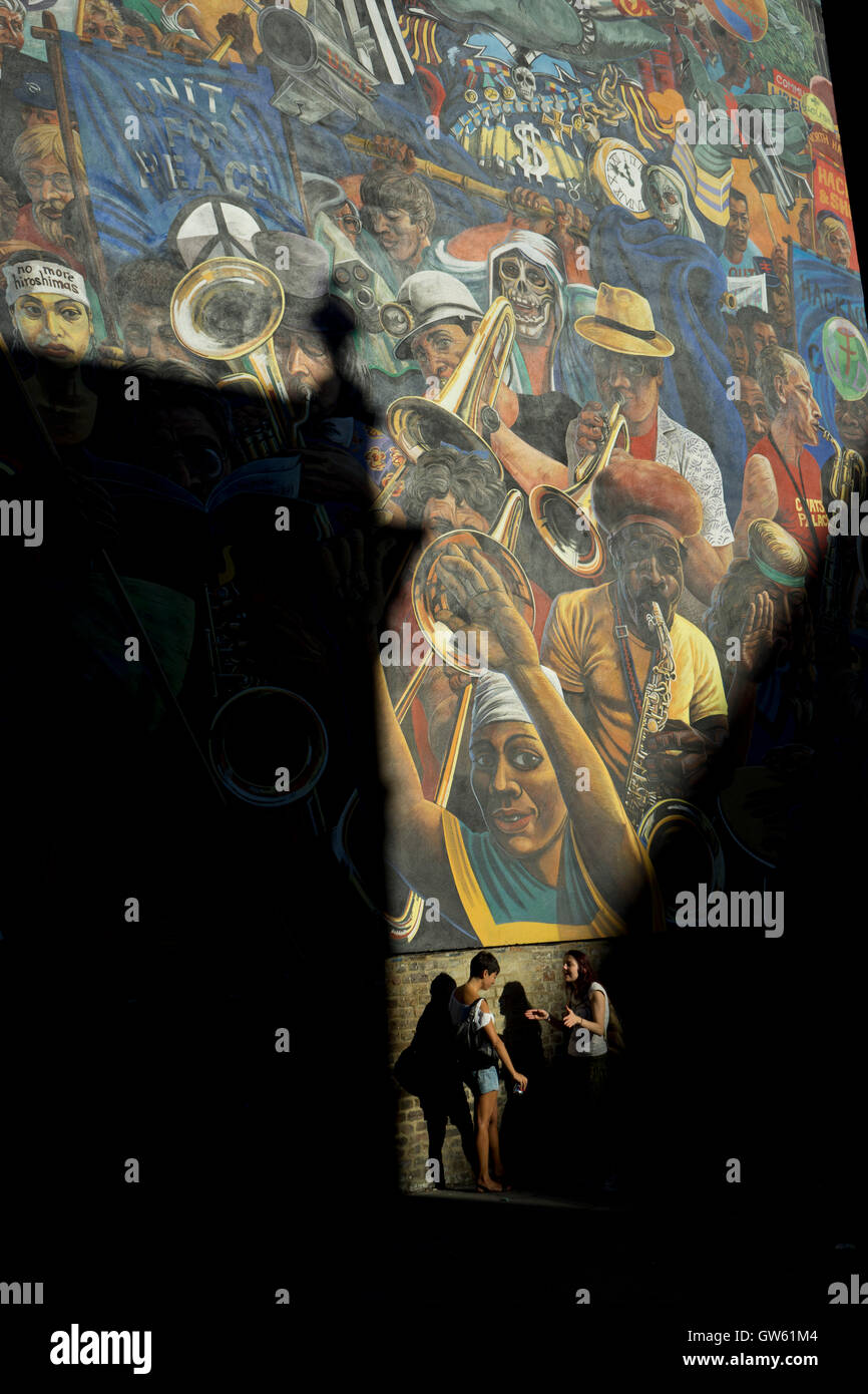 Women talking by Peace mural in Dalston. Hackney, London. UK Stock ...