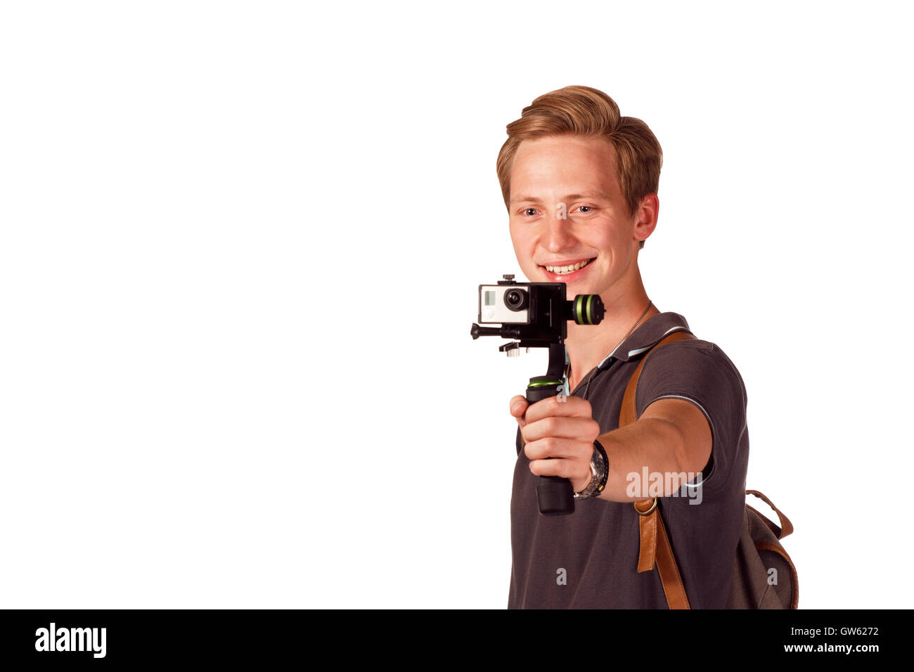 Closeup portrait of a young man taking a picture from corner over white ...
