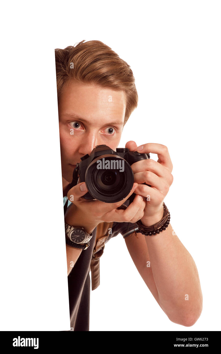 Closeup portrait of a young man taking a picture from corner over white ...