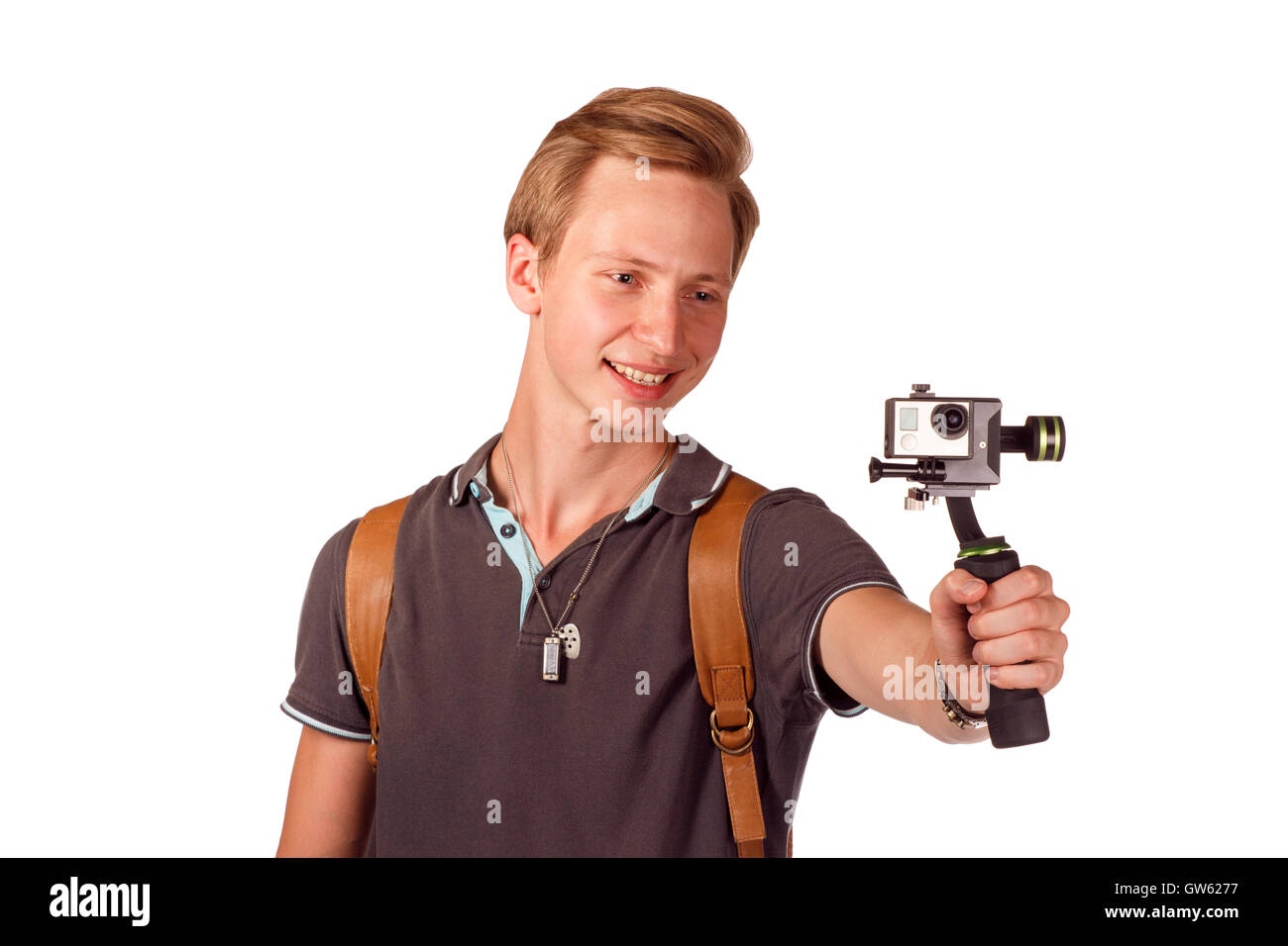 Closeup portrait of a young man taking a picture from corner over white ...