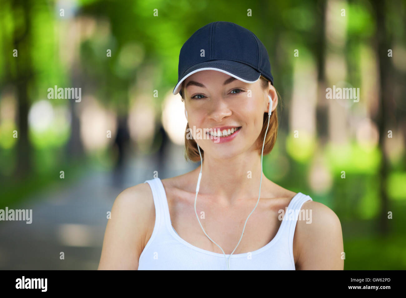Portrait of happy fitness woman ready to start morning workout Stock ...