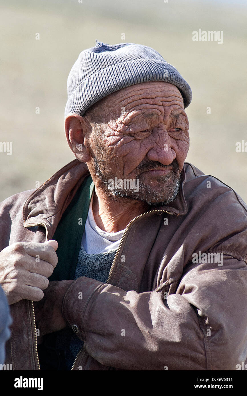 Face of a gold digger plowed by wrinkles due to continuous exposure to ...
