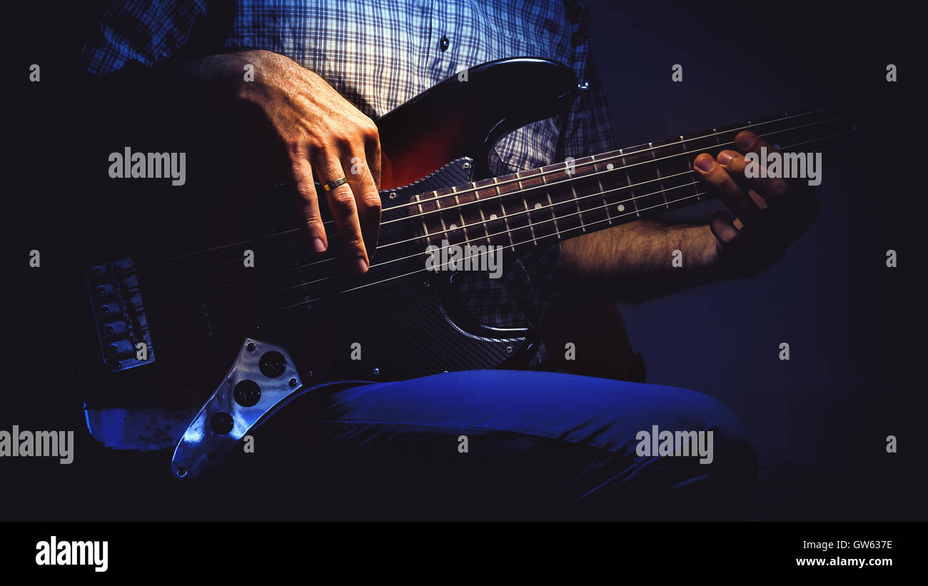 Male bass guitar player hi-res stock photography and images - Alamy
