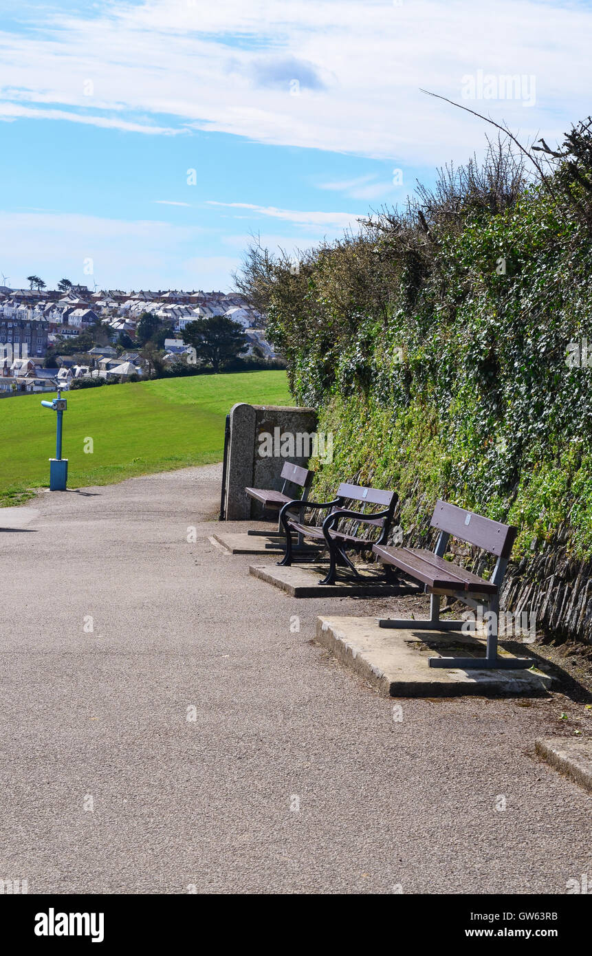 Park benches in Padstow, Cornwall, England, UK Stock Photo - Alamy