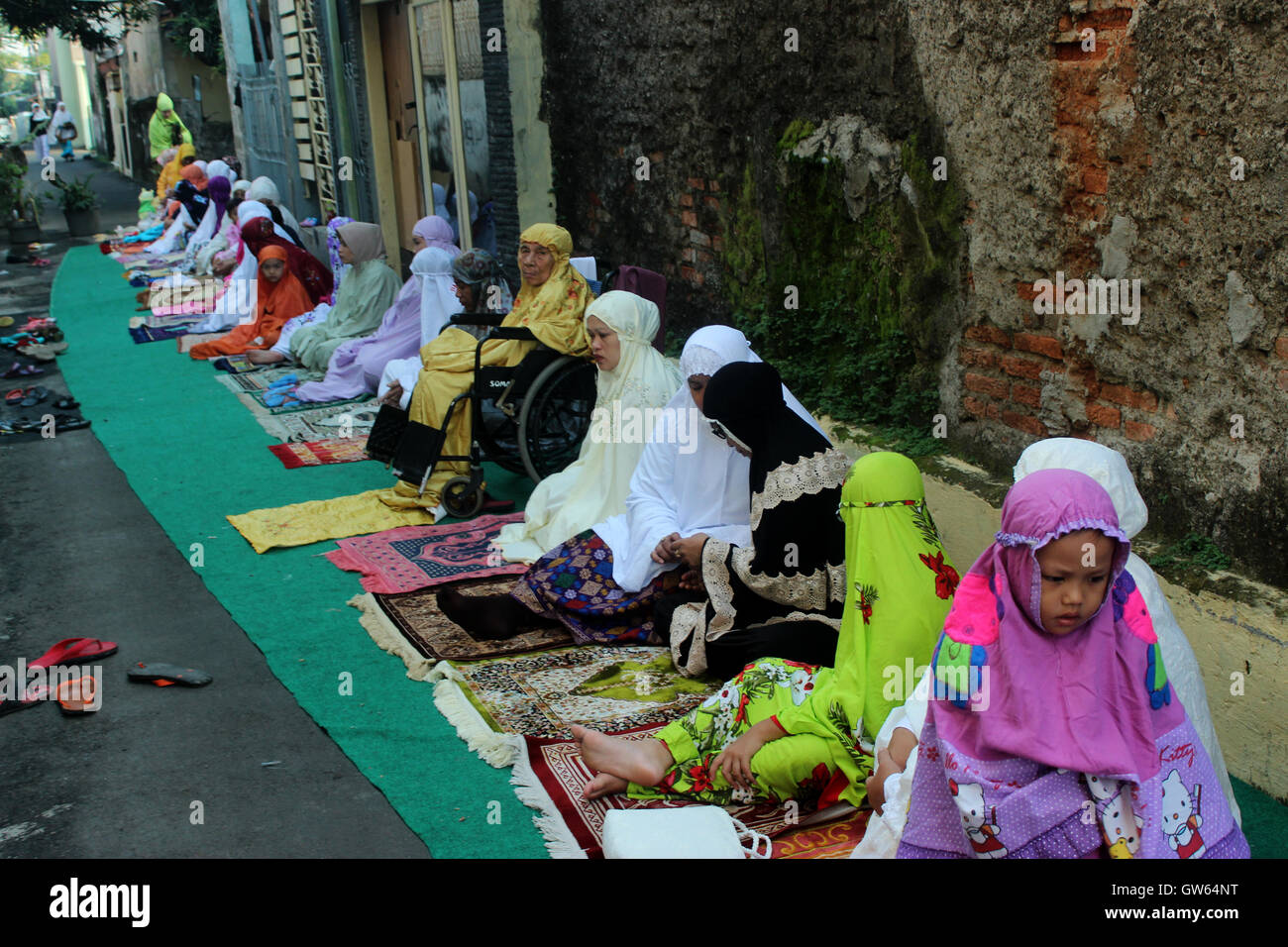 Jakarta, Indonesia. 12th Sep, 2016. Muslim people join together to pray ...