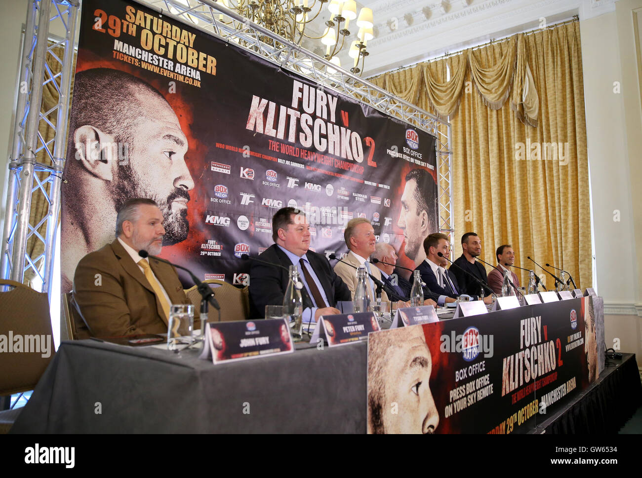 Promoters Frank Warren (centre) and Mick Hennessy during a press ...