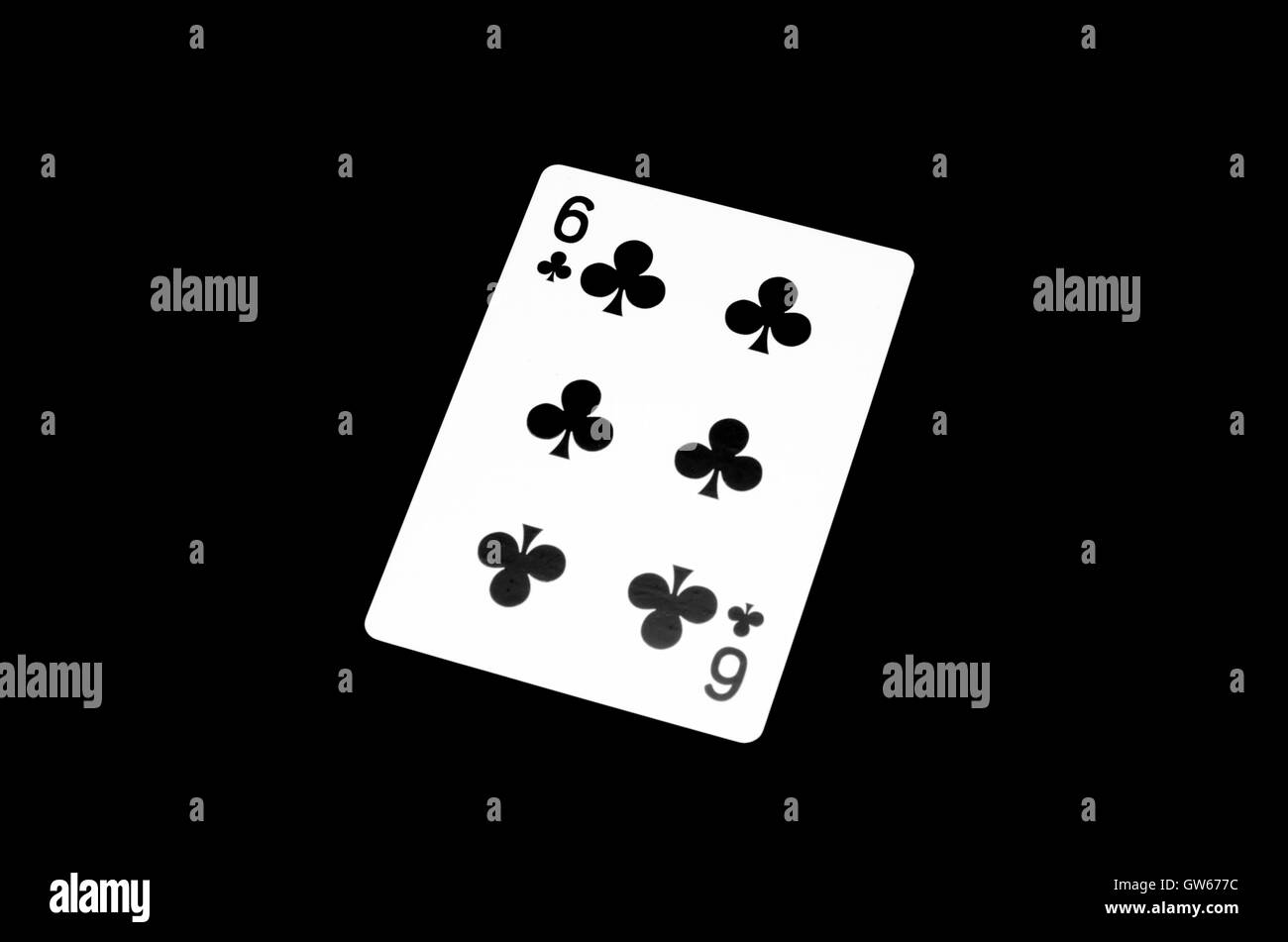 number six clover card isolated on black Stock Photo - Alamy