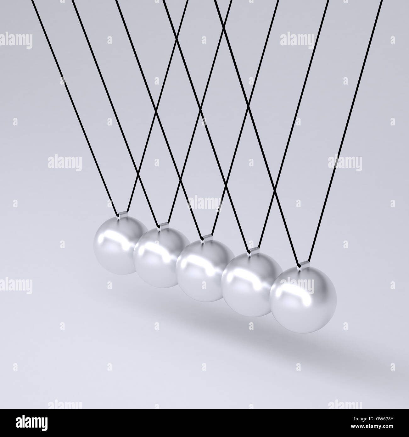 Close up of Newton's cradle Stock Photo - Alamy