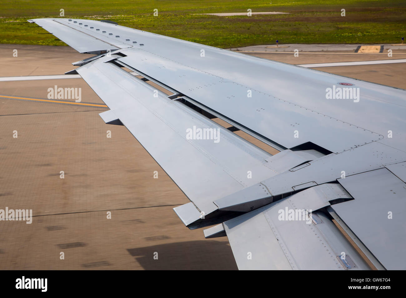 aircraft plane wing taking off on airport Stock Photo - Alamy