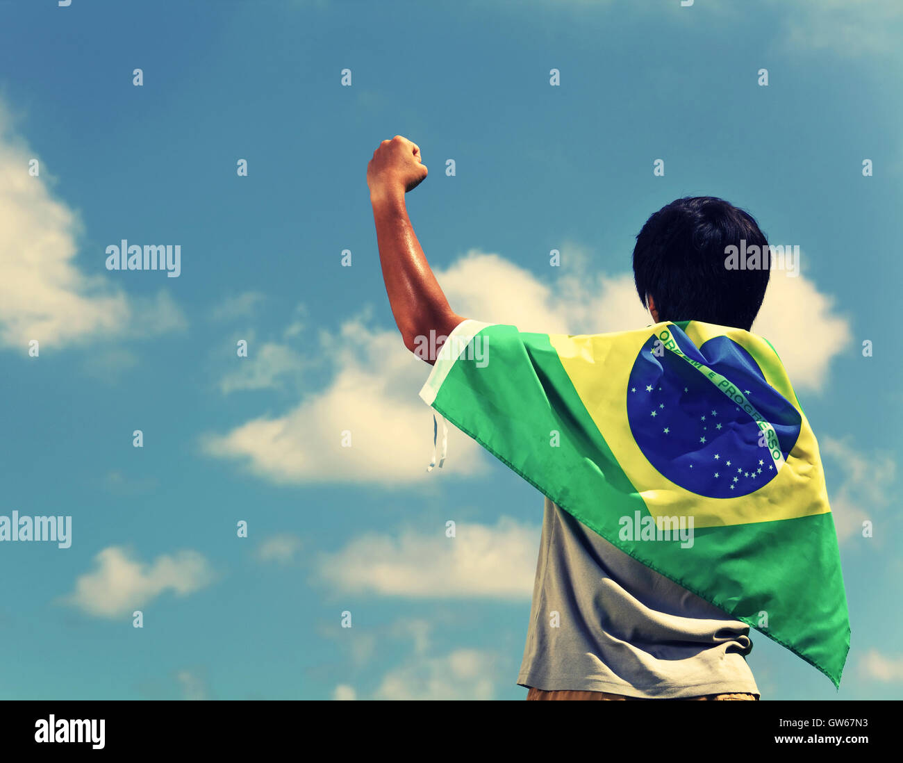 Excited man holding a brazil flag Stock Photo - Alamy