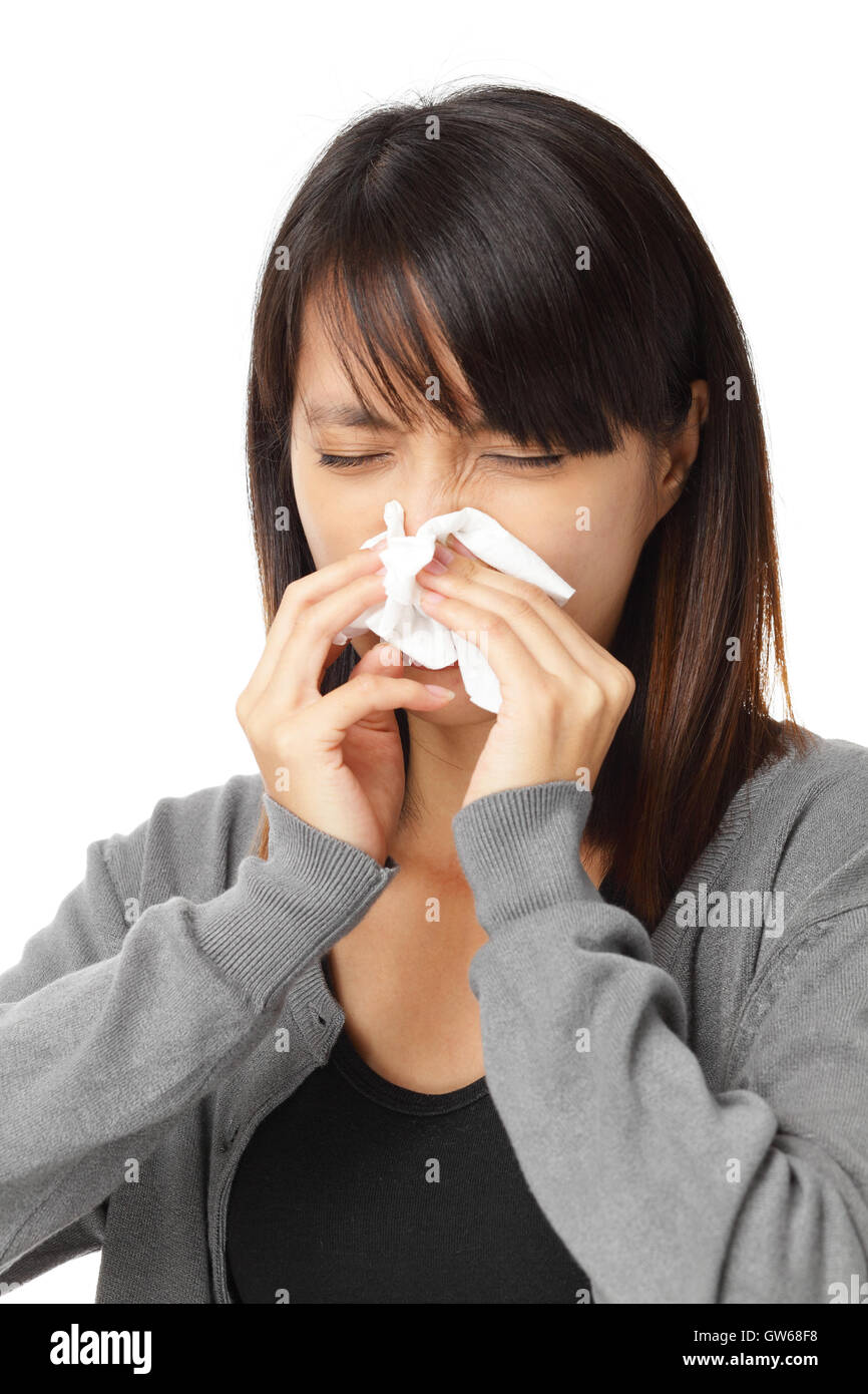 Asian girl blowing nose hi-res stock photography and images - Alamy