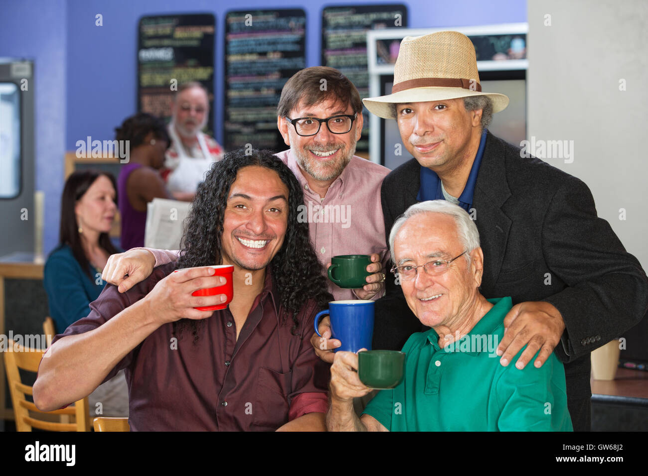 Diverse Group with Coffee Mugs Stock Photo - Alamy