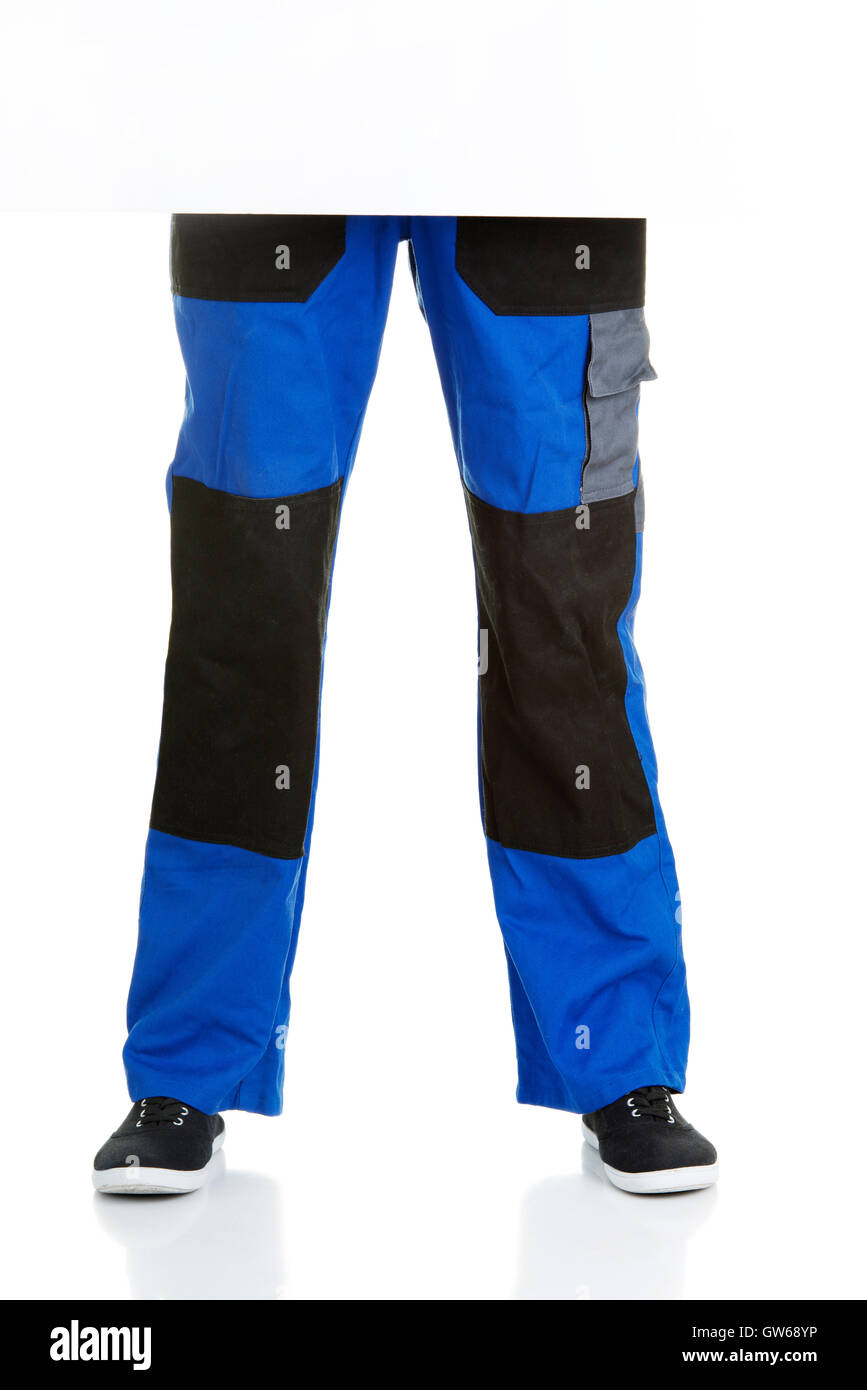 Legs of construction worker Stock Photo - Alamy