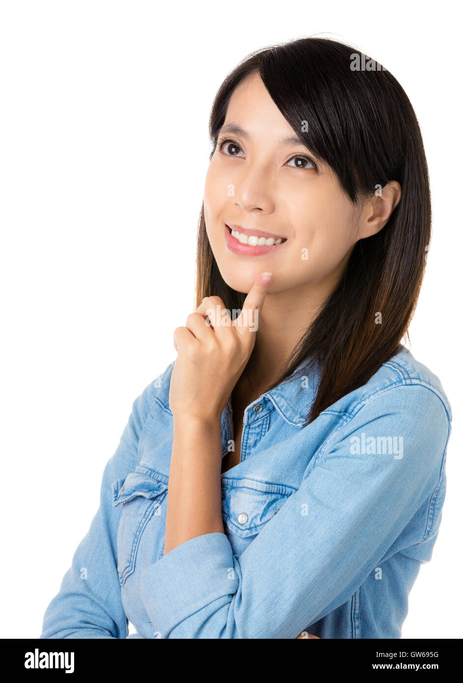 Asian thoughtful woman looking up Stock Photo - Alamy
