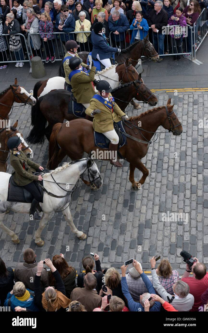 Some of the 280 horses ride up the Royal Mile during the Edinburgh ...