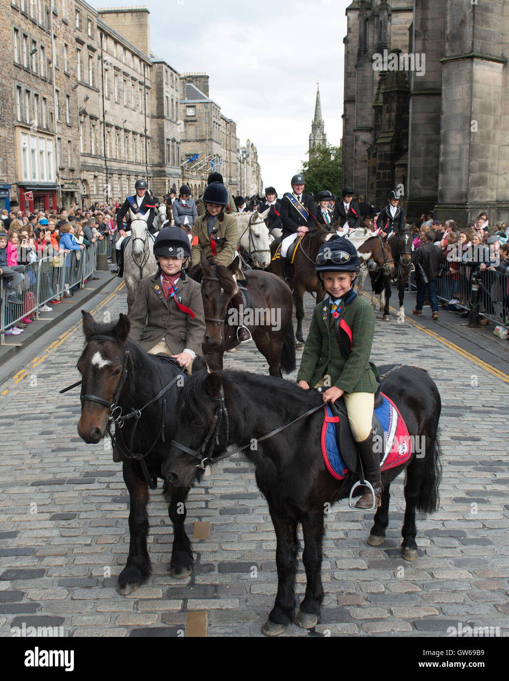 Some of the 280 horses ride up the Royal Mile during the Edinburgh ...