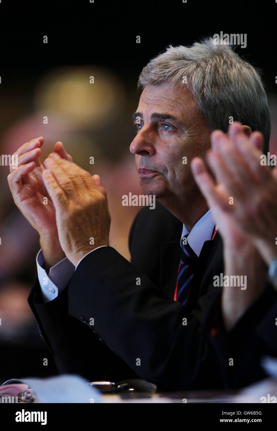 Dave Prentis, General Secretary of UNISON, listens to speeches at the ...