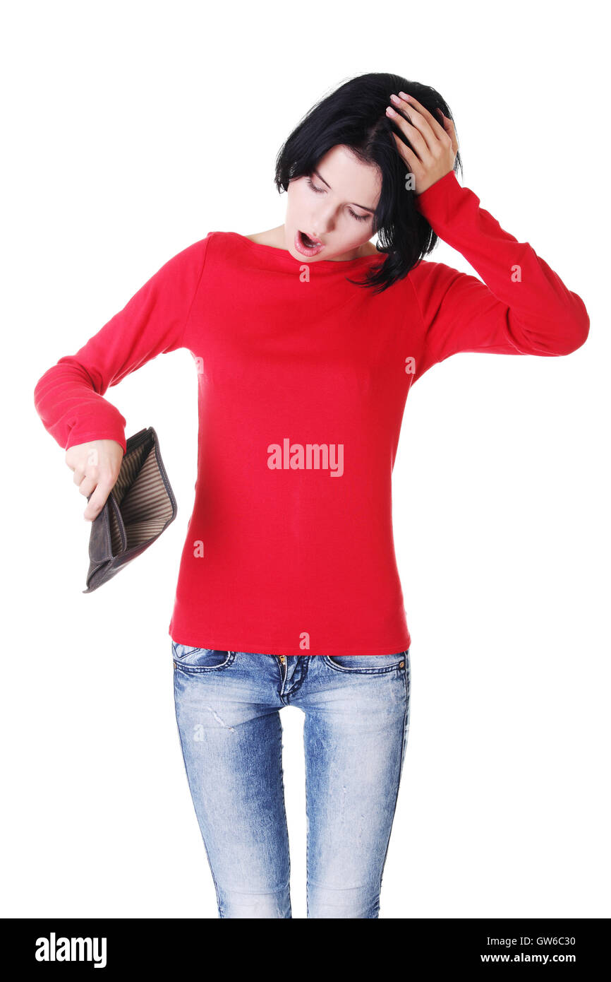 Young woman shows her empty wallet Stock Photo - Alamy