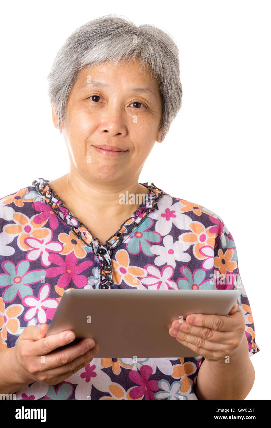 Asian old woman using digital tablet Stock Photo - Alamy