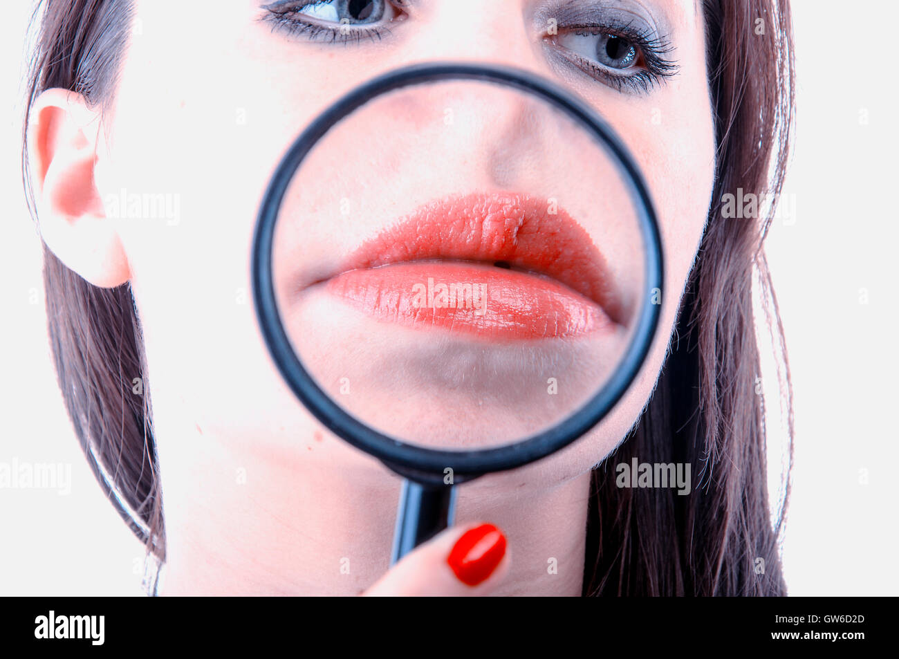Women with magnifying glass Stock Photo - Alamy