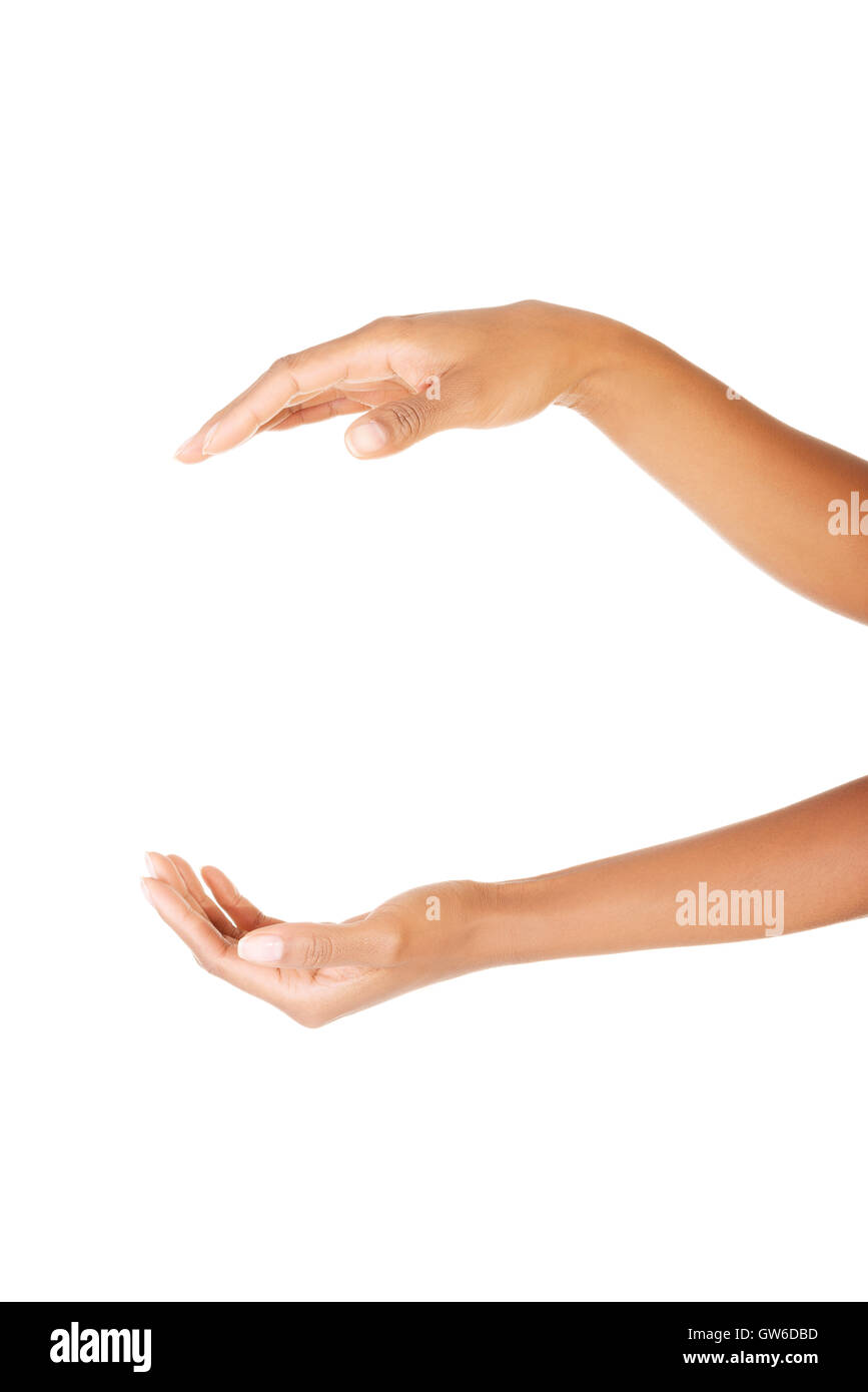 Closeup hand woman pouring Cut Out Stock Images & Pictures - Alamy