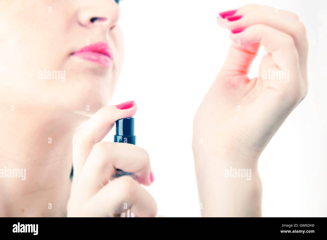 Woman testing perfume Stock Photo - Alamy