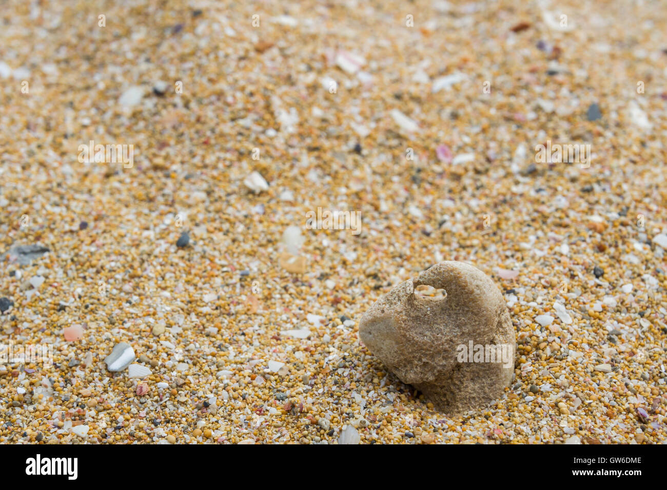 Yellow sand pebble beach hi-res stock photography and images - Alamy