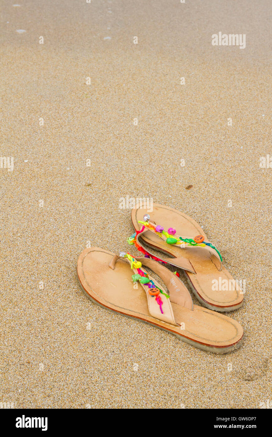 Summer flip flops on the beach Stock Photo - Alamy