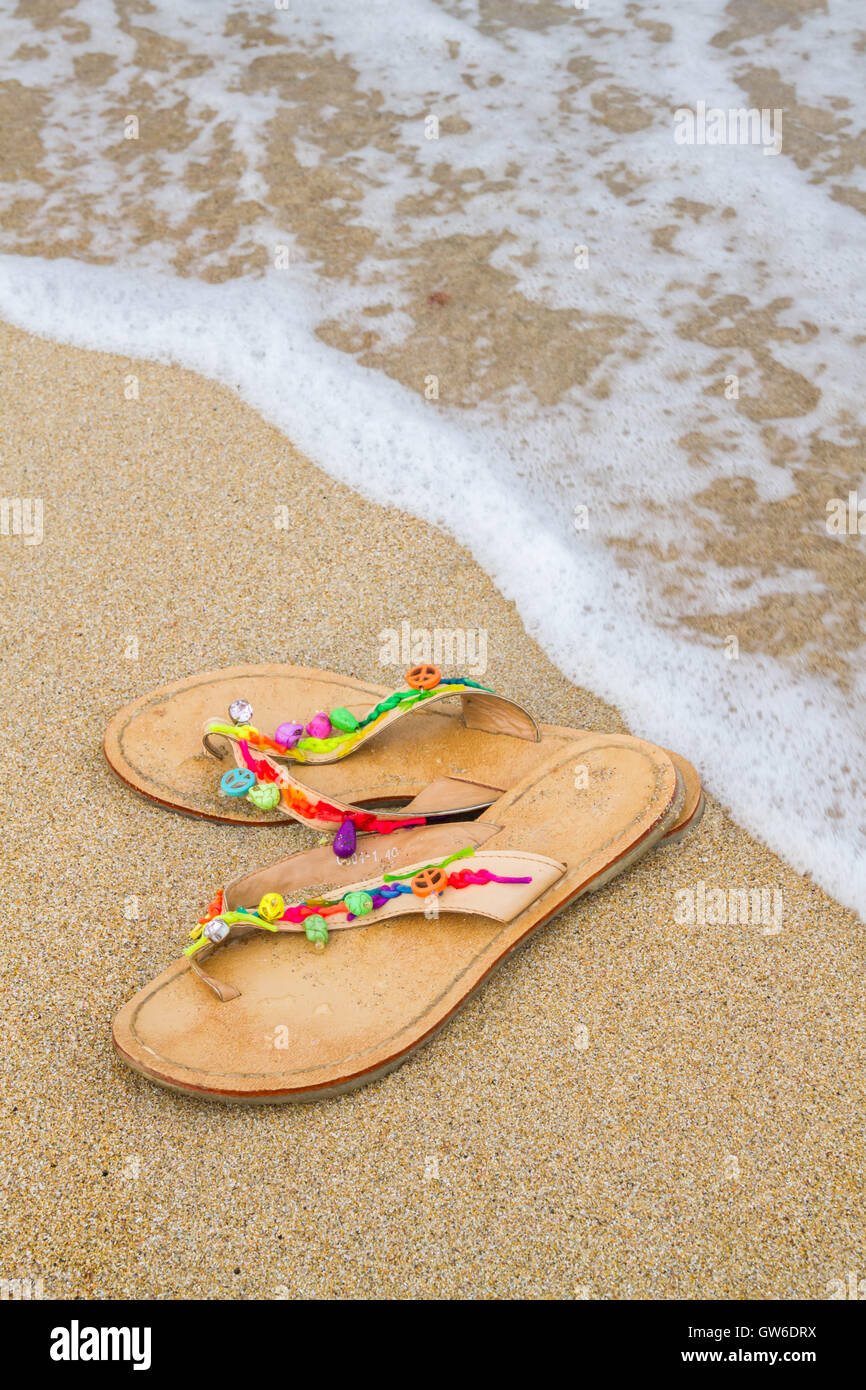 Summer flip flops on the beach Stock Photo - Alamy