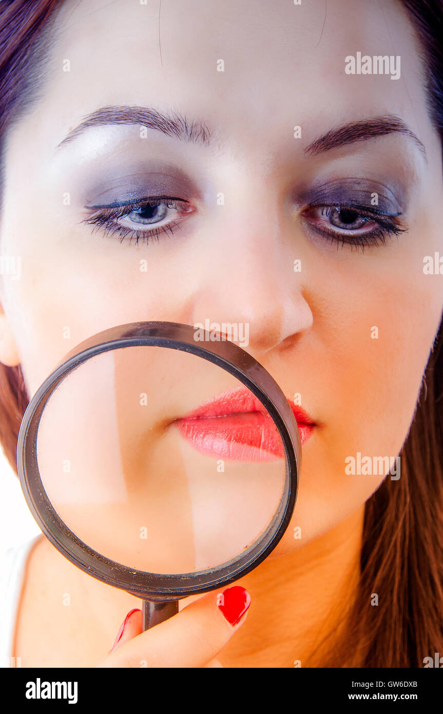 Women with magnifying glass Stock Photo - Alamy