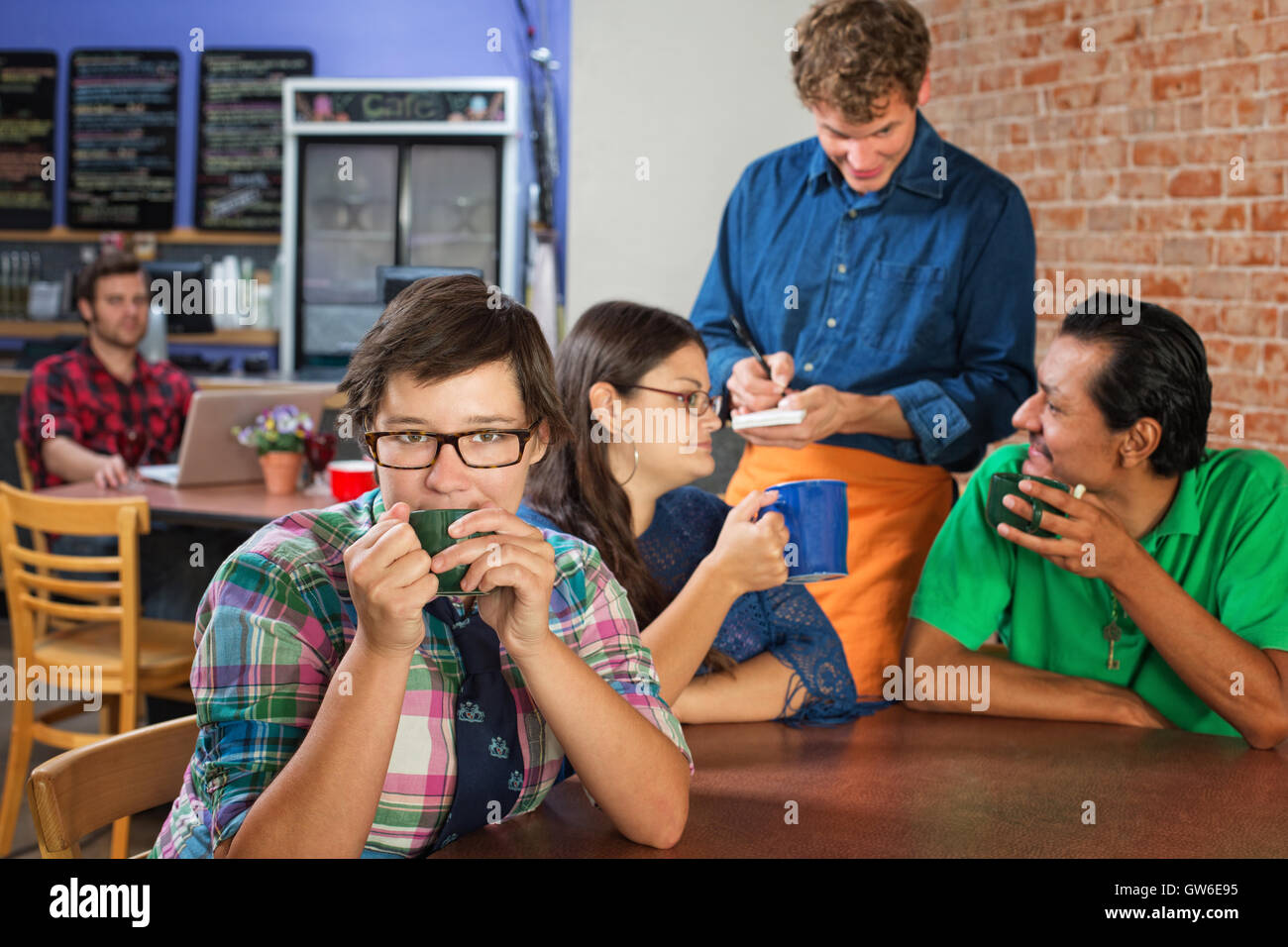 Woman Sipping Coffee Stock Photo - Alamy