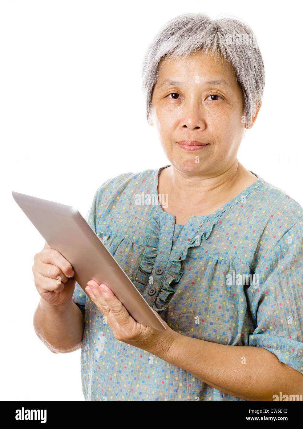 Asian old woman using tablet Stock Photo - Alamy