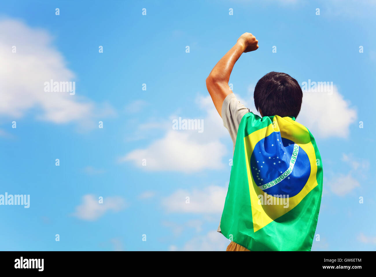 Excited man holding brazil flag Stock Photo - Alamy