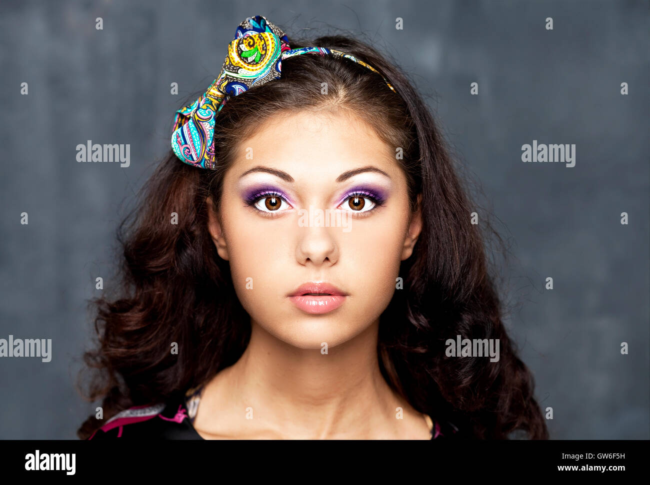 Portrait of a young woman with a rim on the head Stock Photo - Alamy
