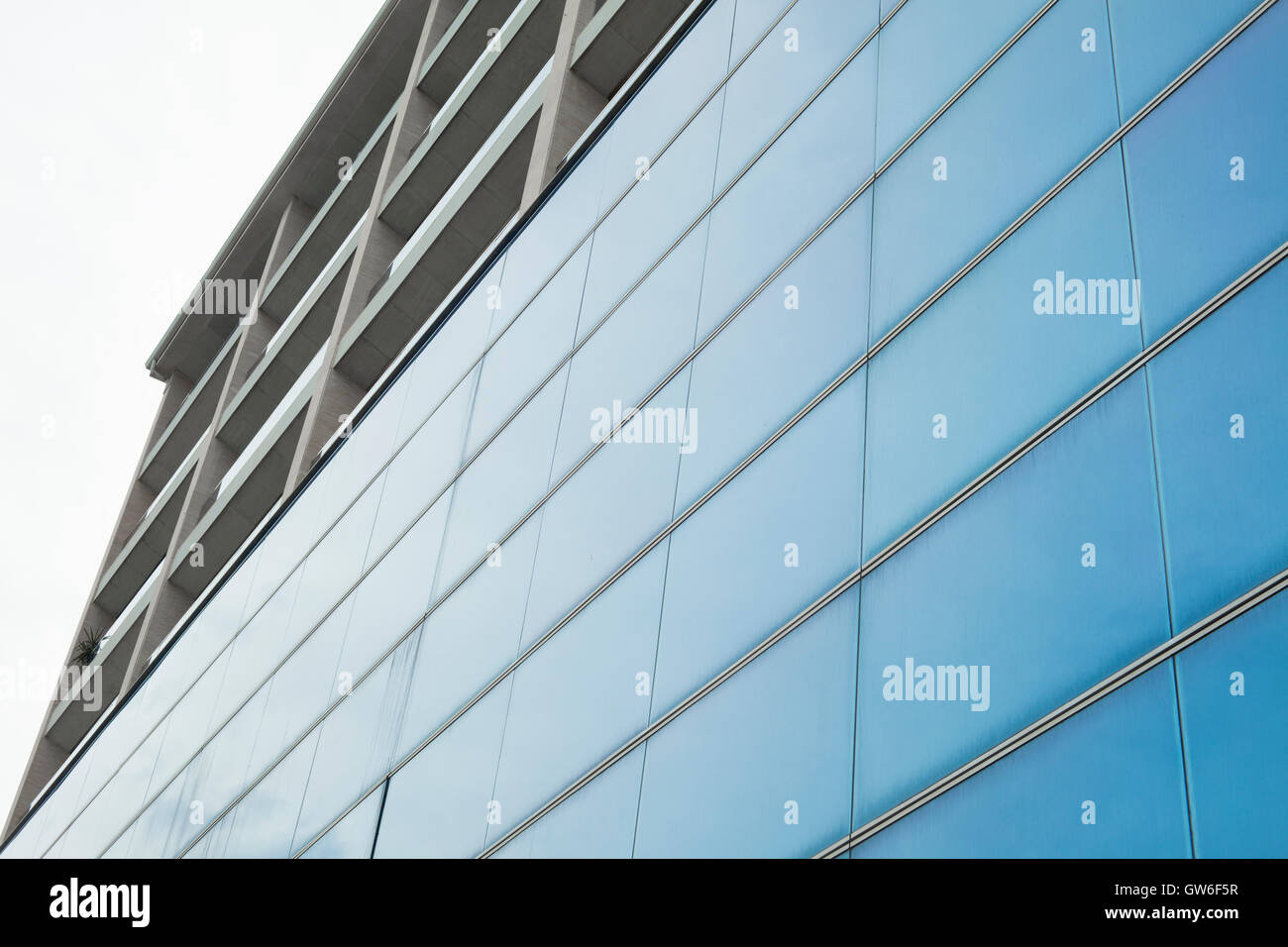 Detail of blue glass facade of a contemporary building Stock Photo - Alamy